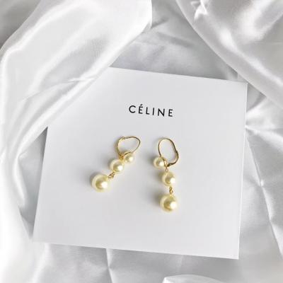 China New Celine Winter Style Pearl String Earrings Plated 19K Gold Brass Ear Stud JY0002 for sale