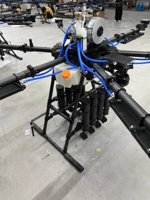 China Four-Axis 4-Rotor UAV FOC Drive 3090 Folding Propeller Tethered Drone with auto retractable hose reel Cable Reel for sale