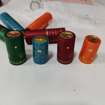 China Customized PVC Necking Tape Glass Bottle Shrink Cap for Beverage Packaging Solutions for sale