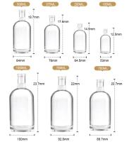 China Clear Oval Shape Flask 100ml 250ml 500ml 700ml 750ml Empty Wine Bottle with Corks for sale