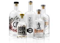 China Clear Oval Shape Flask 100ml 250ml 500ml 700ml 750ml Empty Wine Bottle with Corks for sale