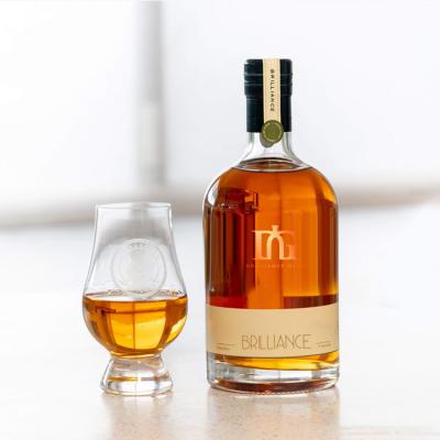China Custom Engraving Clear Liquor Bottle with Screw Cap and Decal Surface Handling for sale