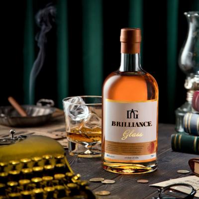 China Custom Engraving Clear Liquor Bottle with Screw Cap and Decal Surface Handling for sale