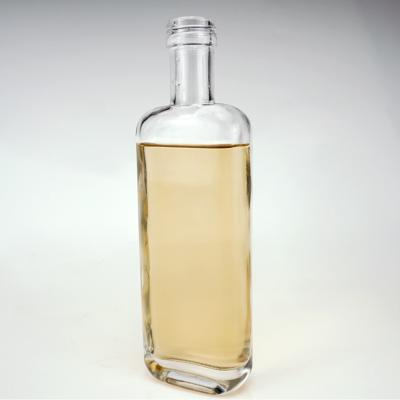 China 700ml Clear Flat Square Glass Vodka Whiskey Bottle with Screw Cap and Engraving Logo for sale
