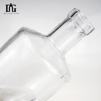 China Shaped Shrink Cap Seal Glass Bottles for Liquor and Wine 700ml Capacity Screw Cap for sale