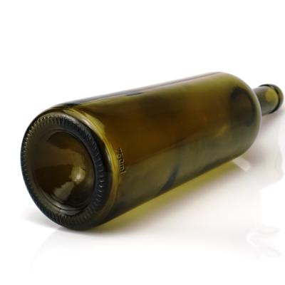 Cina Bottiglia in vetro a colori migliori da 750 ml per liquori di vino rosso, forma rotonda, tappeto a vite a sughero verde in vendita