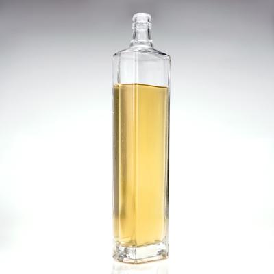 China Acceptable Customer's Logo Glass Bottle Shaped Triangle 650ml Liquor Whisky with Cork for sale