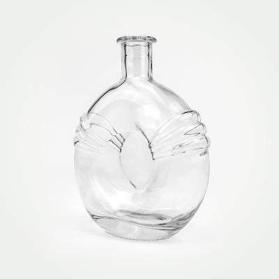 Cina 500 ml 700 ml bottiglia di vetro trasparente con tappo di sughero per brandy accettabile OEM/ODM Unico in vendita