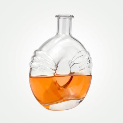 Cina 500 ml 700 ml bottiglia di vetro trasparente con tappo di sughero per brandy accettabile OEM/ODM Unico in vendita