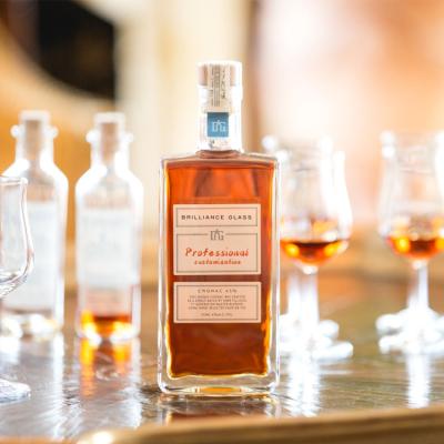 China Engraved Glass Bottle for Custom 700ml Gin Rum Empty 700ml 750ml Vodka Whiskey Brandy for sale