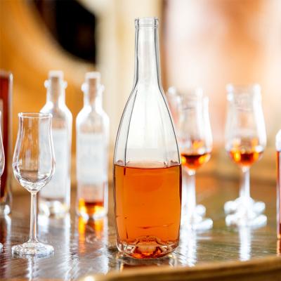 Cina OEM/ODM Acceptabile bottiglia di vetro trasparente 700ml 750ml per liquori e bevande in vendita