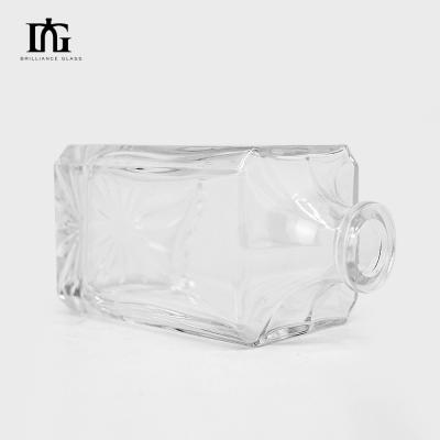 Cina 200 ml 350 ml 500 ml 700 ml 1000 ml bottiglia di liquore in vetro con incisione per la tequila di lusso in vendita