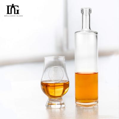 China OEM/ODM Acceptable 500ml Crystal White Glass Bottle Straight Round Flat Shoulder Design for sale