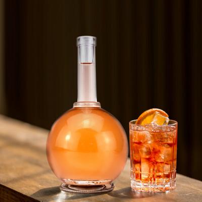 China Garrafas de vidro redondas industriais de 500 ml para bebidas de cortiça tipo tampa de parafuso à venda