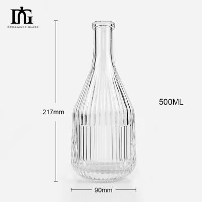 China Garrafa de vidro de 450 ml/700 ml/750 ml gravada para apresentação comercial de bebidas alcoólicas em clara à venda