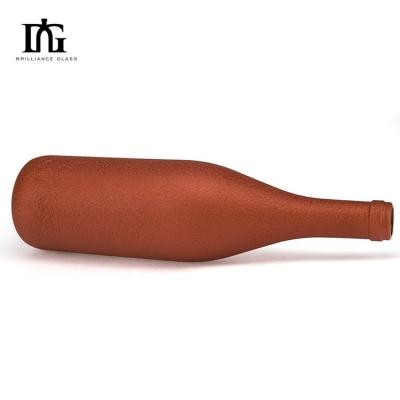 Cina 500 ml 700 ml 750 ml Bottiglia di vetro rotonda per vino liquoroso Whisky in materiale di pietra in vendita