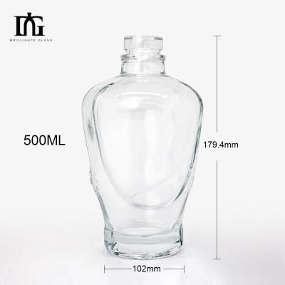 Cina Logo del cliente accettabile Bottiglia di liquore in vetro da 750 ml per vodka rotonda chiara su misura in vendita