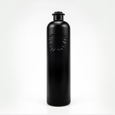Cina 750 ml Bottiglia di vetro chiara rotonda con tappo di sughero per cognac Gin Rum Vodka Tequila Liquore in vendita