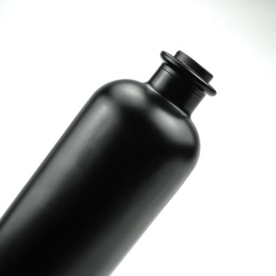 Cina 750 ml Bottiglia di vetro chiara rotonda con tappo di sughero per cognac Gin Rum Vodka Tequila Liquore in vendita