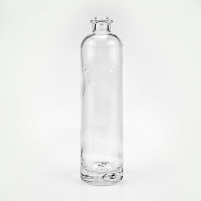Cina 750 ml Bottiglia di vetro chiara rotonda con tappo di sughero per cognac Gin Rum Vodka Tequila Liquore in vendita