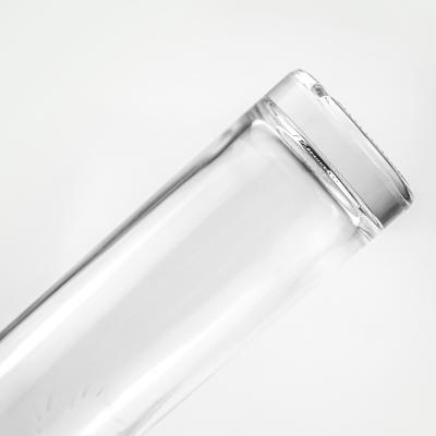 Cina 750 ml Bottiglia di vetro chiara rotonda con tappo di sughero per cognac Gin Rum Vodka Tequila Liquore in vendita