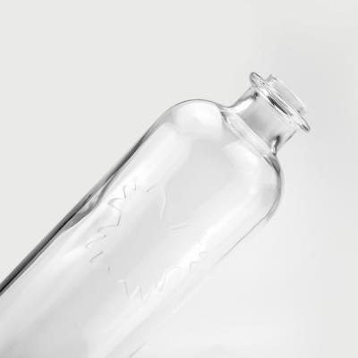 Cina 750 ml Bottiglia di vetro chiara rotonda con tappo di sughero per cognac Gin Rum Vodka Tequila Liquore in vendita