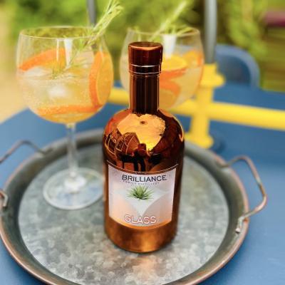 Cina Bottiglia di vetro rotonda trasparente per liquori Vodka Gin Rum Brandy 750ml 500ml 375ml Capacità in vendita