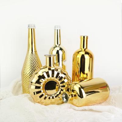 China Glass Base 500ml 750ml Gold Electroplated Wine Bottle with Sealing Cork Base Material for sale