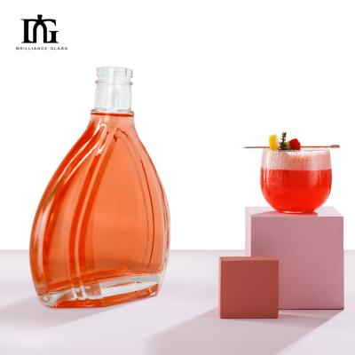 Cina Bottiglia rotonda trasparente da 700 ml a 750 ml di vetro di vodka whisky rum con tappo a vite e campione in vendita
