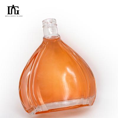 Cina Bottiglia rotonda trasparente da 700 ml a 750 ml di vetro di vodka whisky rum con tappo a vite e campione in vendita