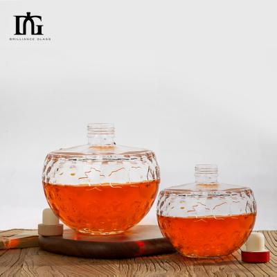 China Wine Table with Bottle and Glass Bottle 500ml 700ml Transparent Unique Empty Flint Portable Picnic for sale