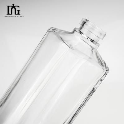 China Transparent Square Glass 500ml 750ml Whiskey Bottle with Cork and Engraving for sale