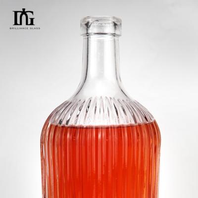 Cina 700 ml/750 ml/1000 ml Bottiglia di vetro trasparente rotonda vuota di vino e rum con sigillo di sughero in vendita