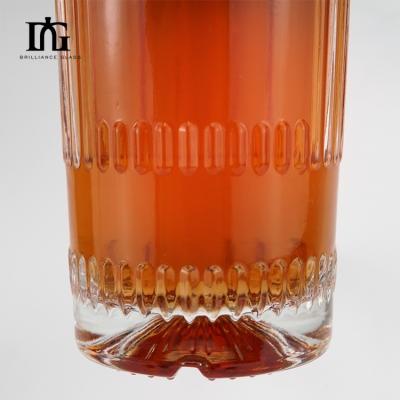 Cina 700 ml/750 ml/1000 ml Bottiglia di vetro trasparente rotonda vuota di vino e rum con sigillo di sughero in vendita