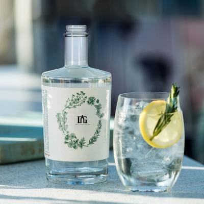 Cina Bottiglia di vetro stampata a caldo incisa su misura 700ml 750ml Whiskey Vodka Bottom spessa in vendita