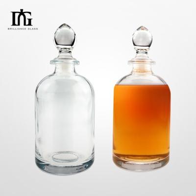 Cina Bottiglia di liquore di vino di frutta di vetro trasparente da 500 ml con superficie incisa in sughero in vendita