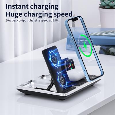 China Relógio de telefone e fones de ouvido carregador sem fio Stand 4 em 1 com 5W / 3W / 15W saída à venda