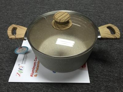 China Non-stick brown coating casserole with glass lid made of forged aluminum for sale