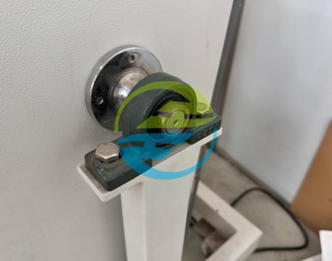 Detailed view of Tumble Drop Tester mechanism