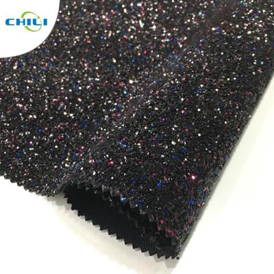 中国 編まれたきらめきのLeatheretteの生地、ピンクのきらめきの生地の軽量の印刷できる 販売のため
