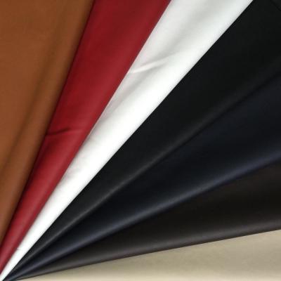 Cina Il tessuto rosso del cuoio dell'unità di elaborazione, cuoio gradisce l'alta elasticità materiale resistente all'uso in vendita
