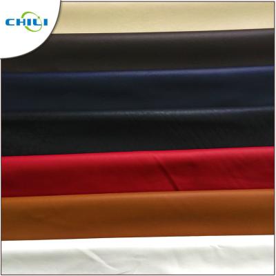 Cina Il tessuto rosso del cuoio dell'unità di elaborazione, cuoio gradisce l'alta elasticità materiale resistente all'uso in vendita