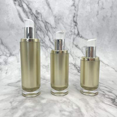 Cina timbratura calda acrilica della pompa di 100ml 120ml della bottiglia dell'oro di plastica vuoto cosmetico della lozione in vendita