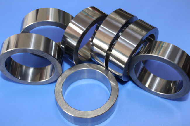 Precision machined tungsten carbide bushing component