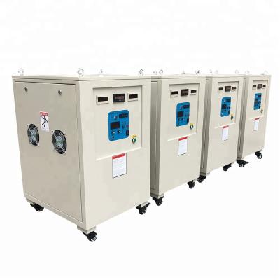 Cina FCC, apparecchio di riscaldamento per media frequenza di induzione del prodotto caldo del CE per il trattamento termico 100KW del metallo in vendita