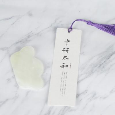 China Irregular Green Jade Gua Sha Massager Tool Ergonomically Designed Body And Face Guasha for sale