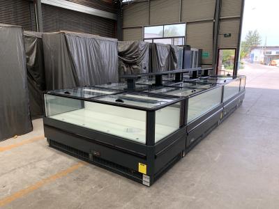 China -18--22°C R290 Modular Plug-In Ventilated Island Freezer with Ultra-Large Curved Glass Display‌ for sale