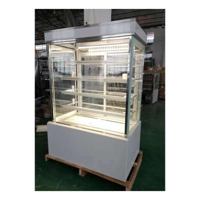 Cina Espositore refrigerato per torte con struttura in acciaio inox e vetro a più ripiani in vendita