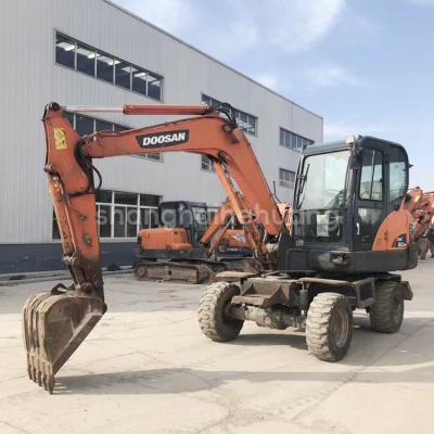 Cina Macchine da costruzione usate Escavatore a ruote di gomma Doosan DX60W 5700kg Peso della macchina in vendita