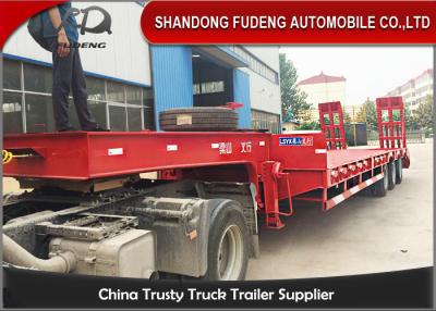 China Heavy duty 40 - 60 ton low flatbed semi trailer excavator carry trucks and trailers for sale